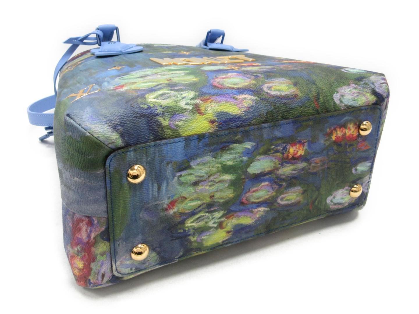 Louis Vuitton Monet Clutch | semashow.com