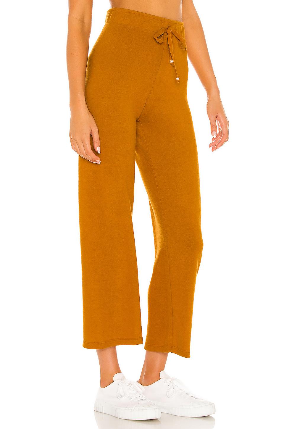 DONNI. Synthetic Sweater Cropped Flare Sweatpant in Orange - Lyst