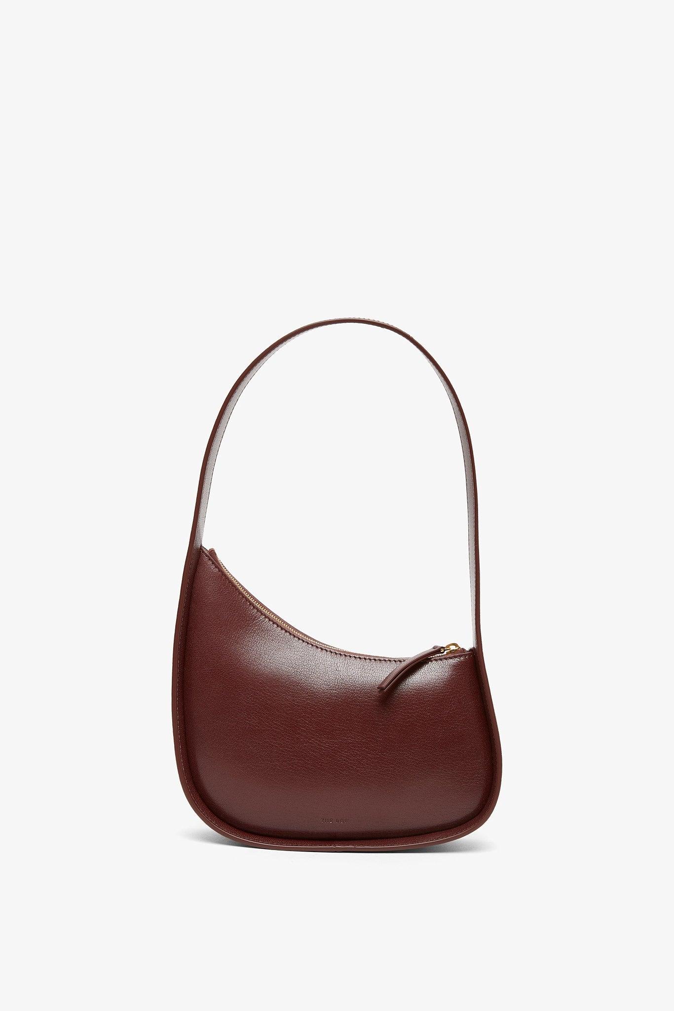 The Row Half Moon Burgundy Leather Bag in Red | Lyst