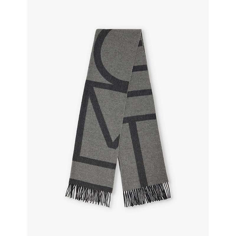 TOTEME Monogram Fringed Wool Scarf in Gray | Lyst