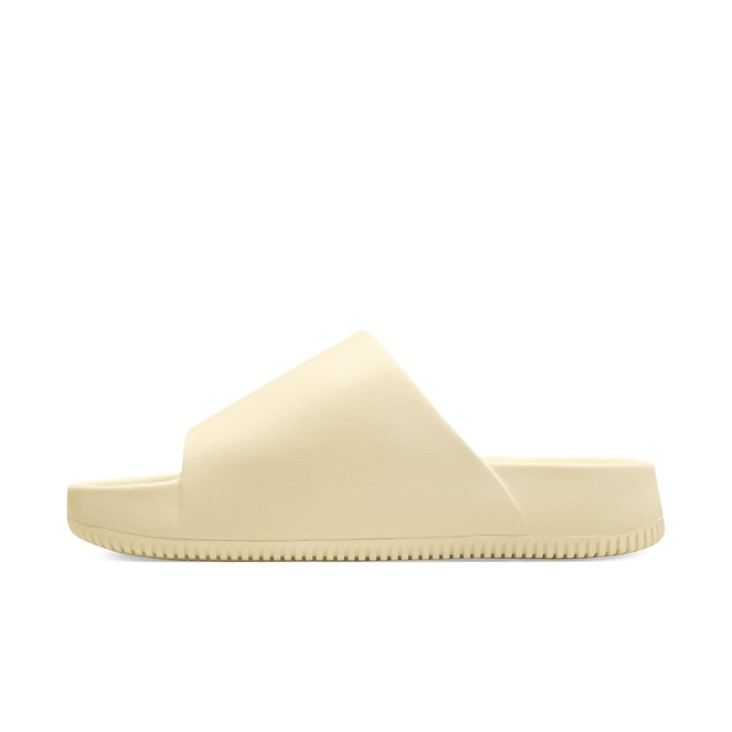 Nike Calm Slide in Natural | Lyst