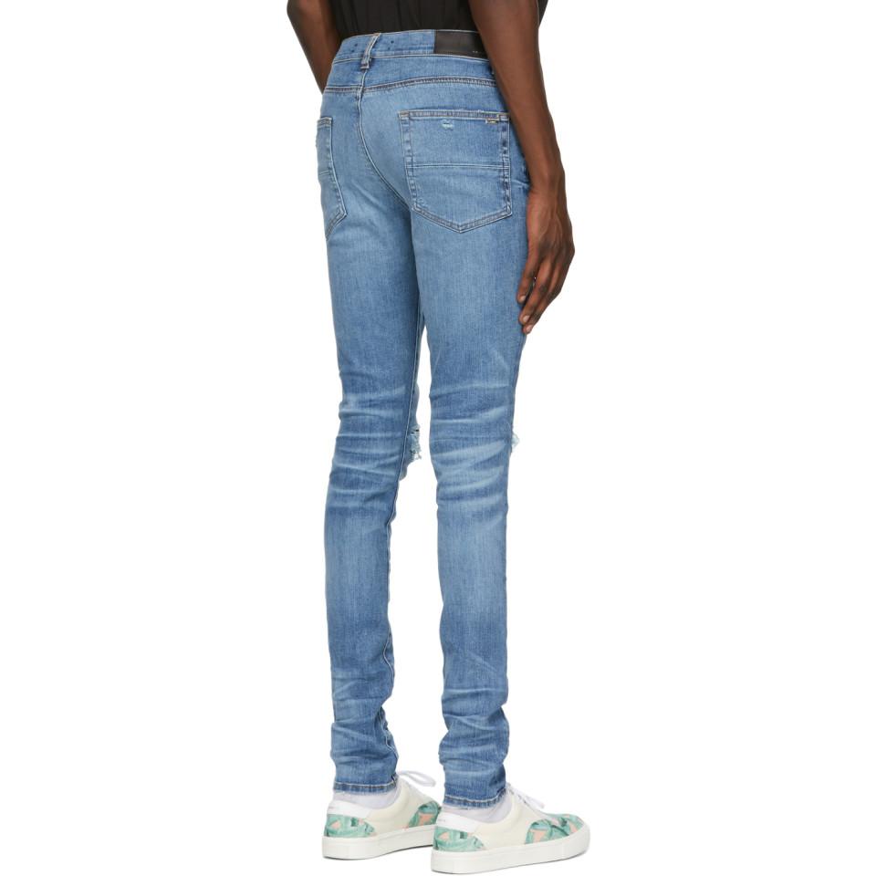 Amiri Thrasher Plus' Distressed Skinny Jeans in Blue for Men Amiri Thrasher Plus' Distressed Skinny Jeans in Blue for Men