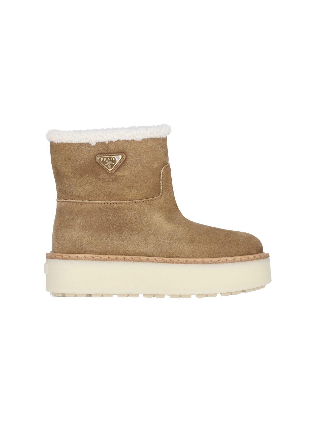 Prada Logo Shearling Boots in Natural | Lyst