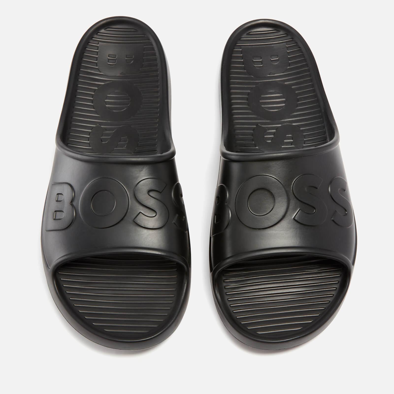 BOSS by HUGO BOSS Darian Logo-deed Rubber Slides in Black for Men | Lyst BOSS by HUGO BOSS Darian Logo-deed Rubber Slides in Black for Men | Lyst
