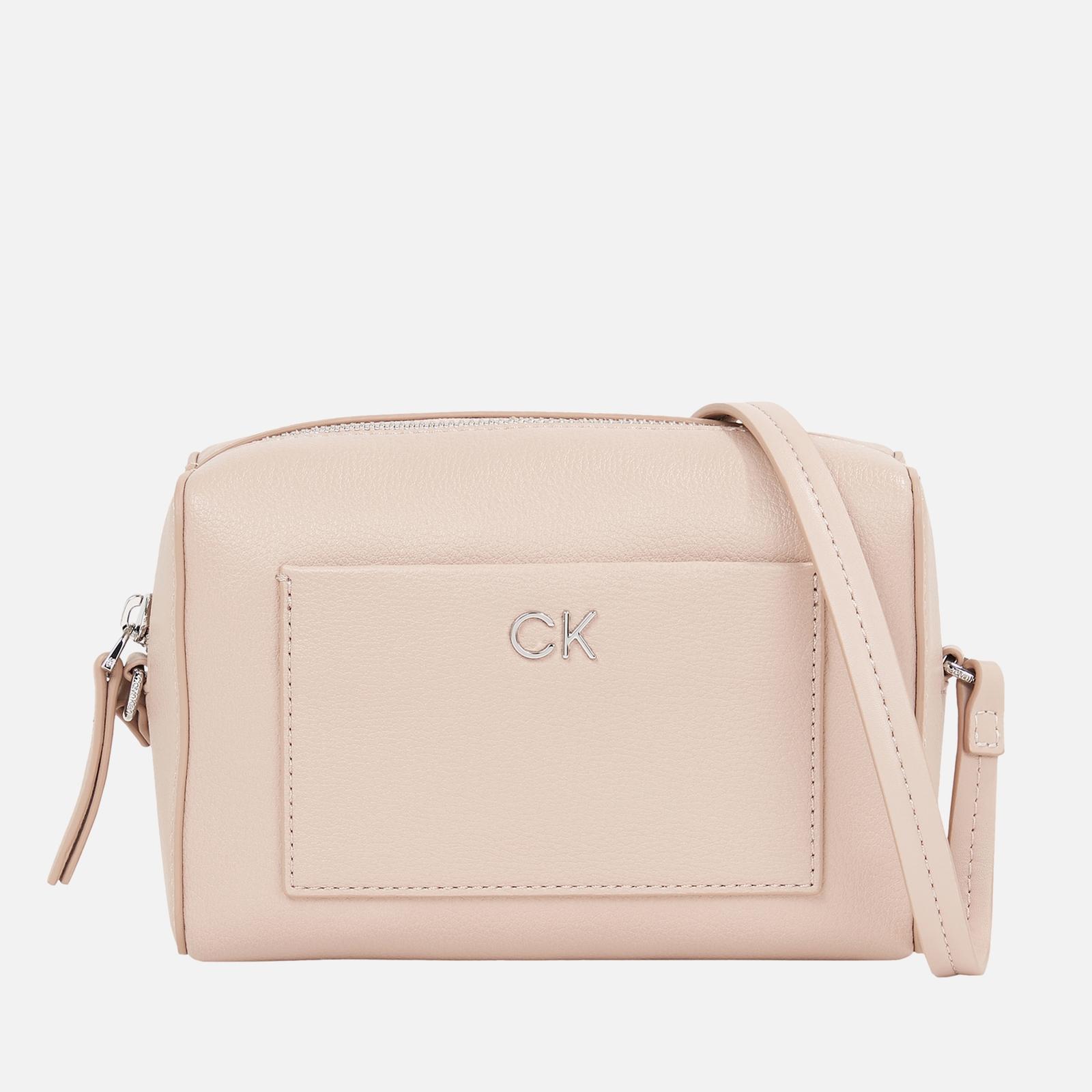Calvin Klein Ck Daily Pebble-grain Faux Leather Camera Bag in Natural ...