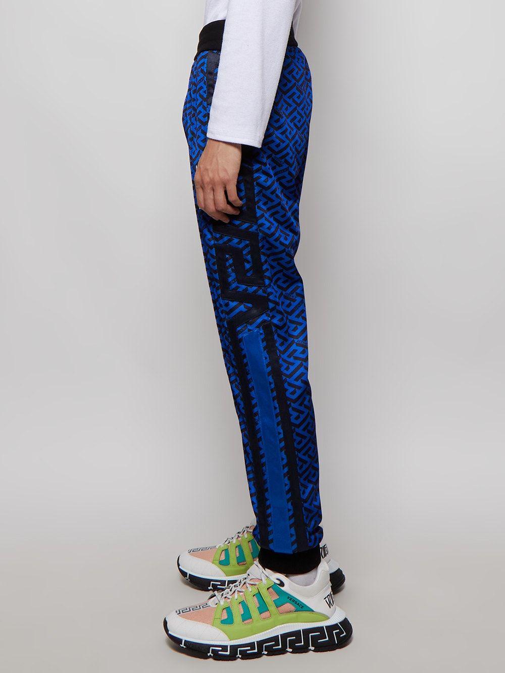 Versace Two Tone Monogram Track Pants In Blue For Men Lyst versace-two-tone-monogram-track-pants-in-blue-for-men-lyst